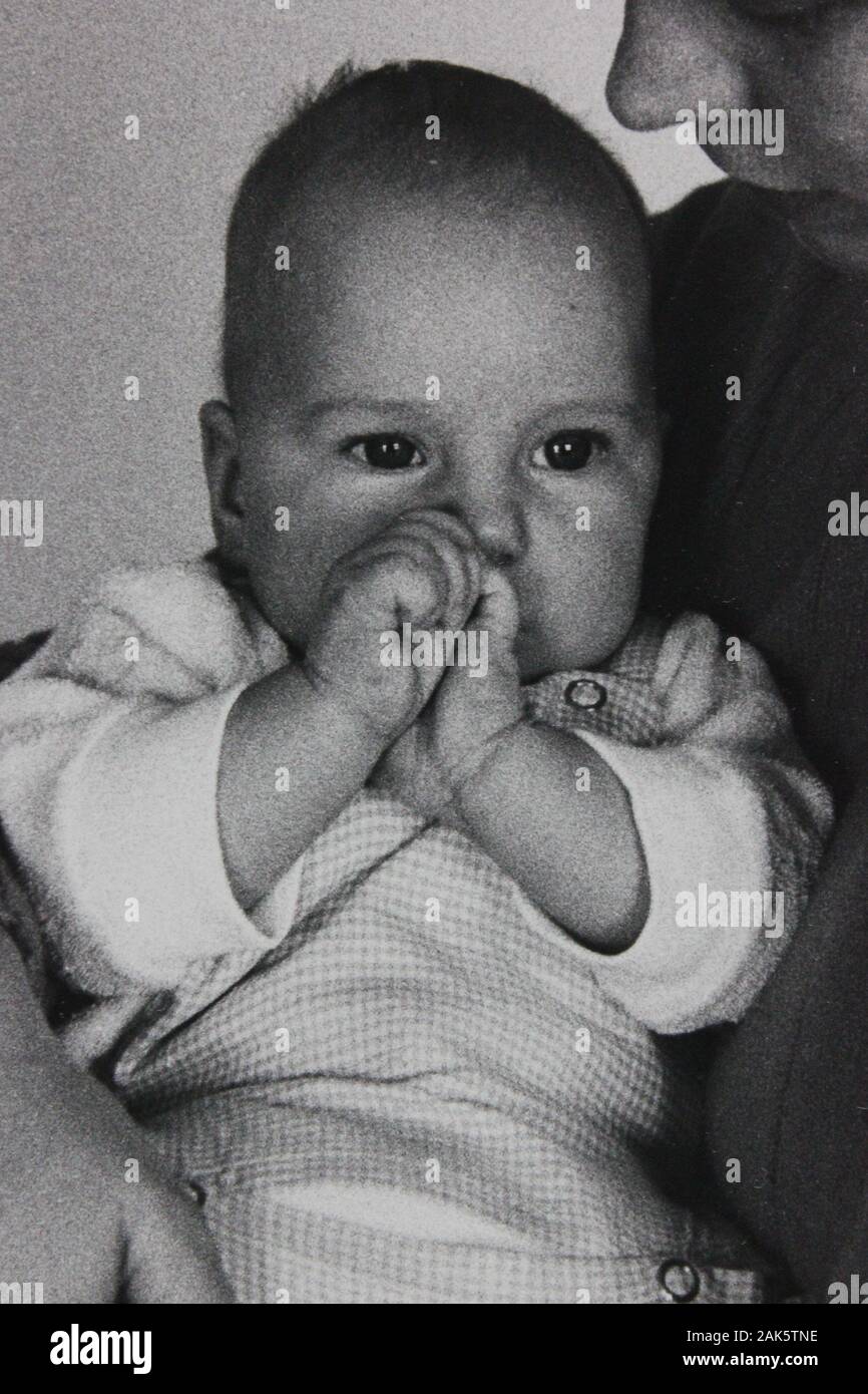 Fine 1970s black and white vintage photography of a baby sitting on her ...