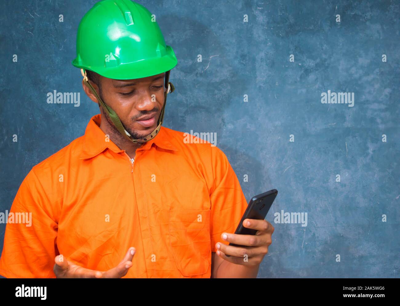 a young African engineer got excited by what he saw on his smart phone ...