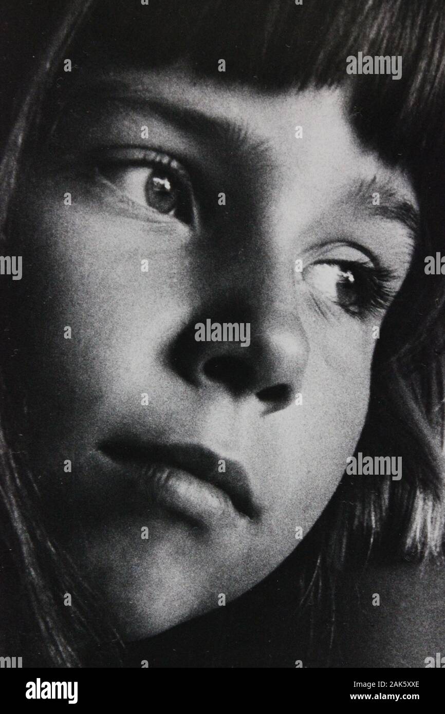 Fine 1970s photography of a young girl looking off into the middle ...