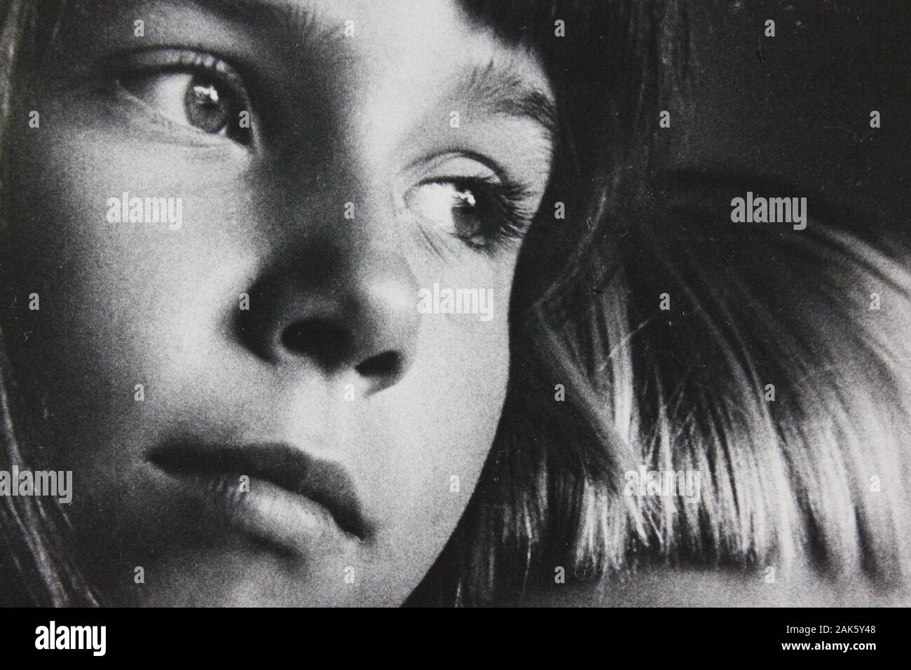 Fine 1970s photography of a young girl looking off into the middle ...