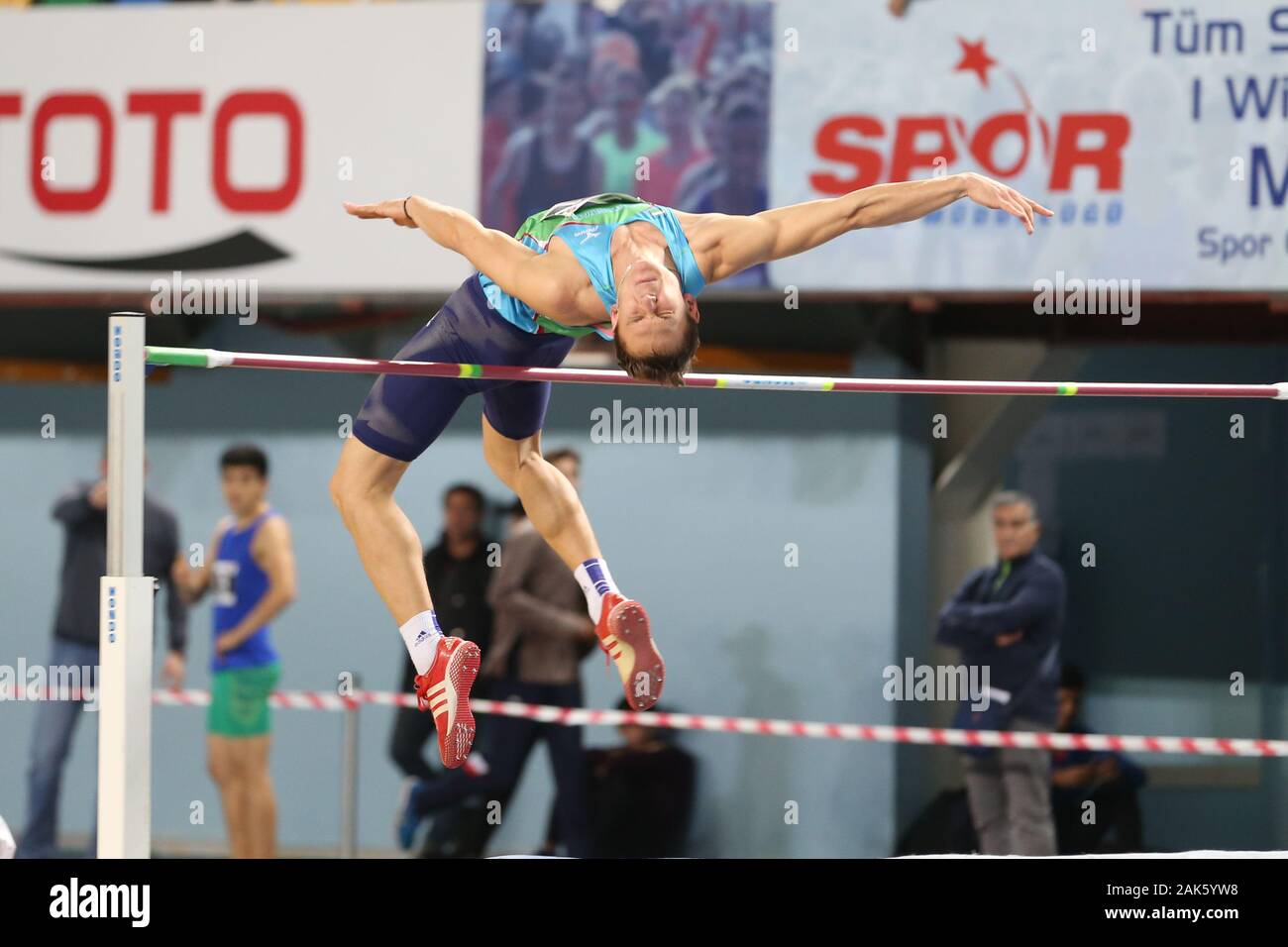 ISTANBUL, TURKEY - DECEMBER 21, 2019: Undefined athlete high jumping ...