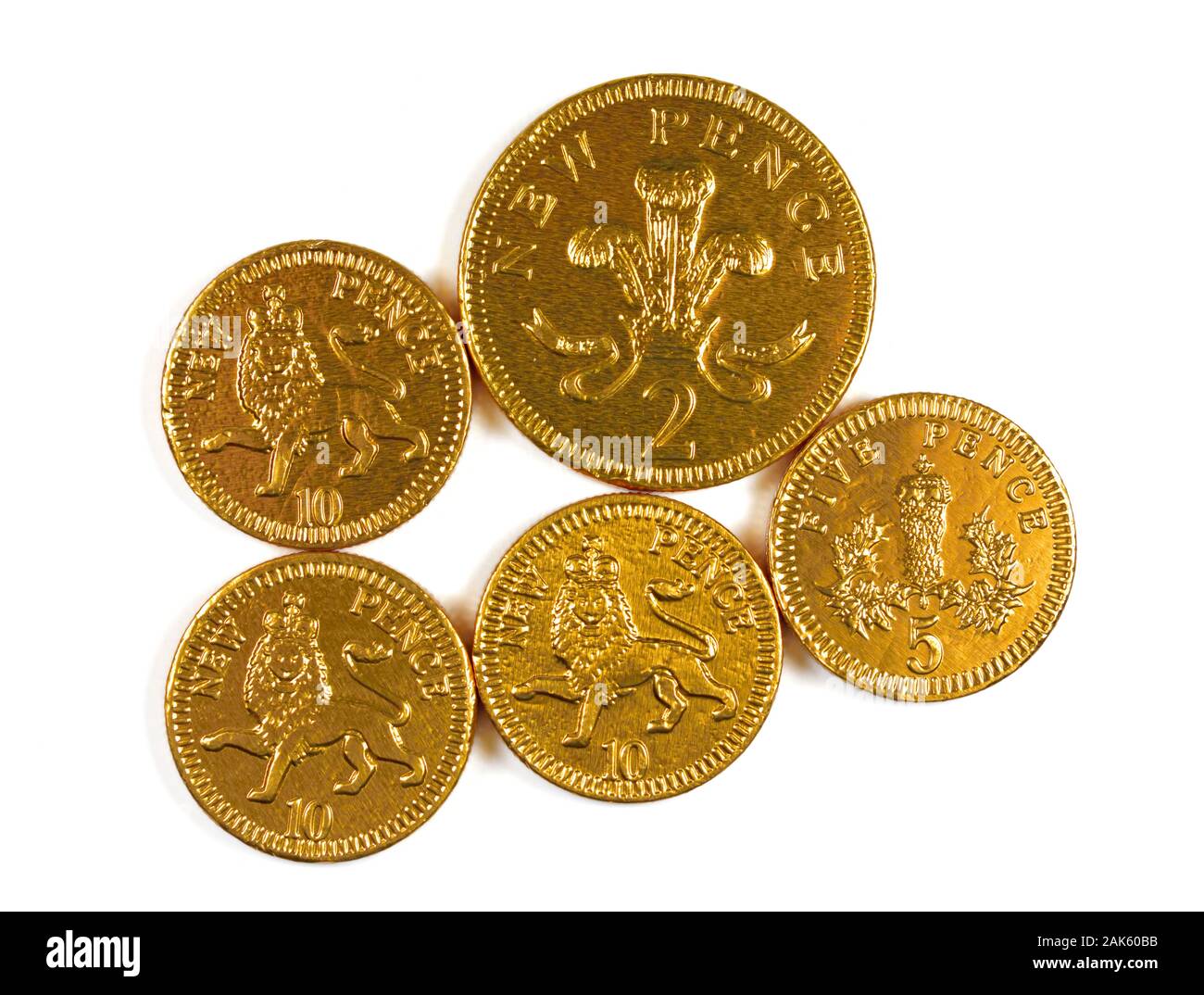 Gold Chocolate coins,white background Stock Photo - Alamy