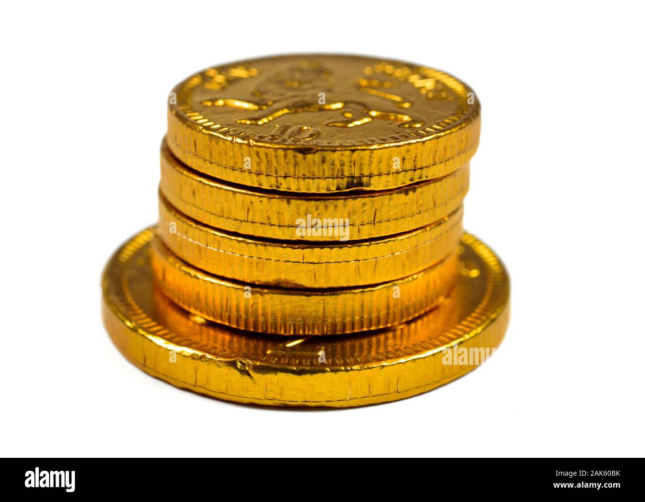 Gold Chocolate coins,white background Stock Photo - Alamy