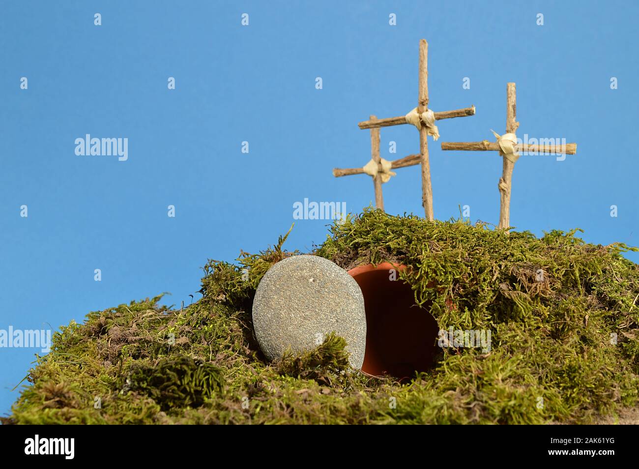 resurrection garden as easter decoration with a stone near the empty ...