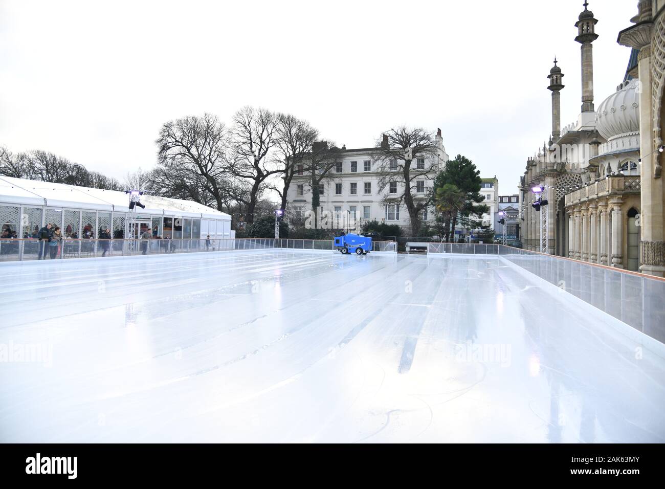 Ice rink surface is being smoothed over before the next set of skaters ...