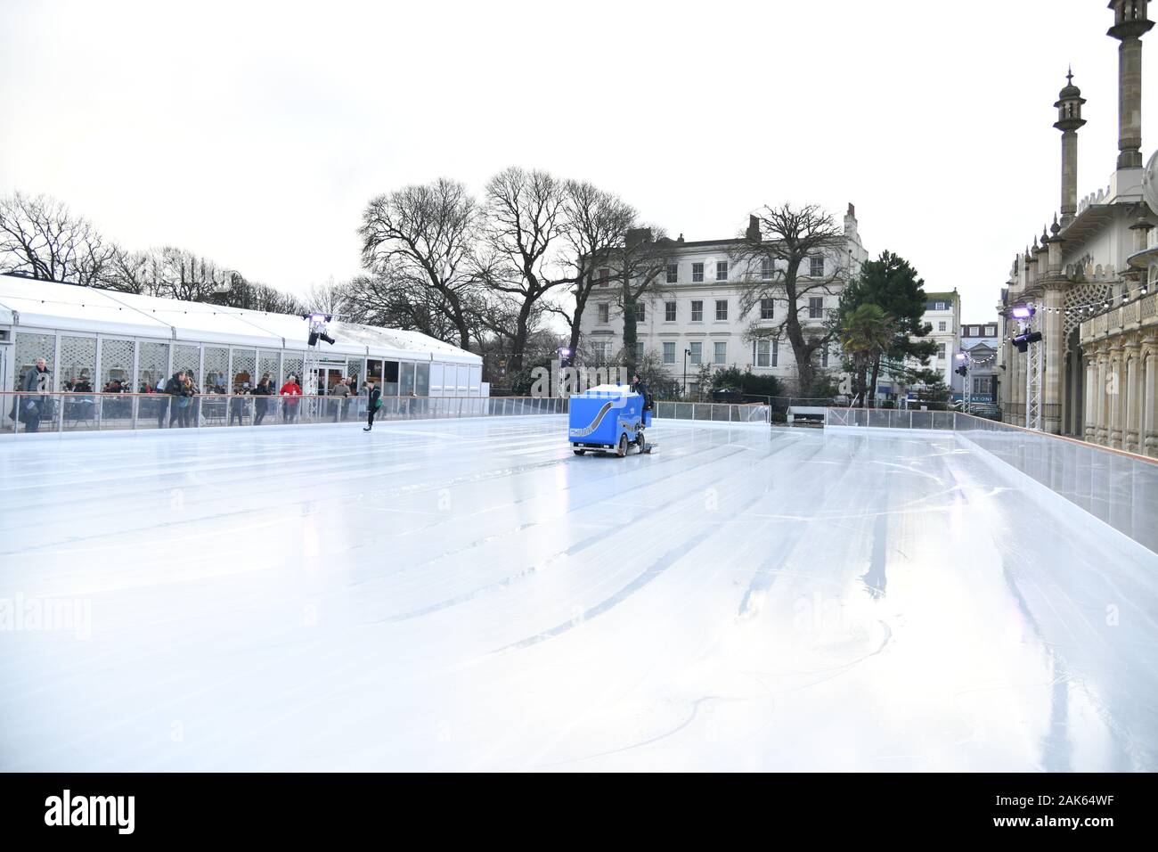 Ice rink surface is being smoothed over before the next set of skaters ...