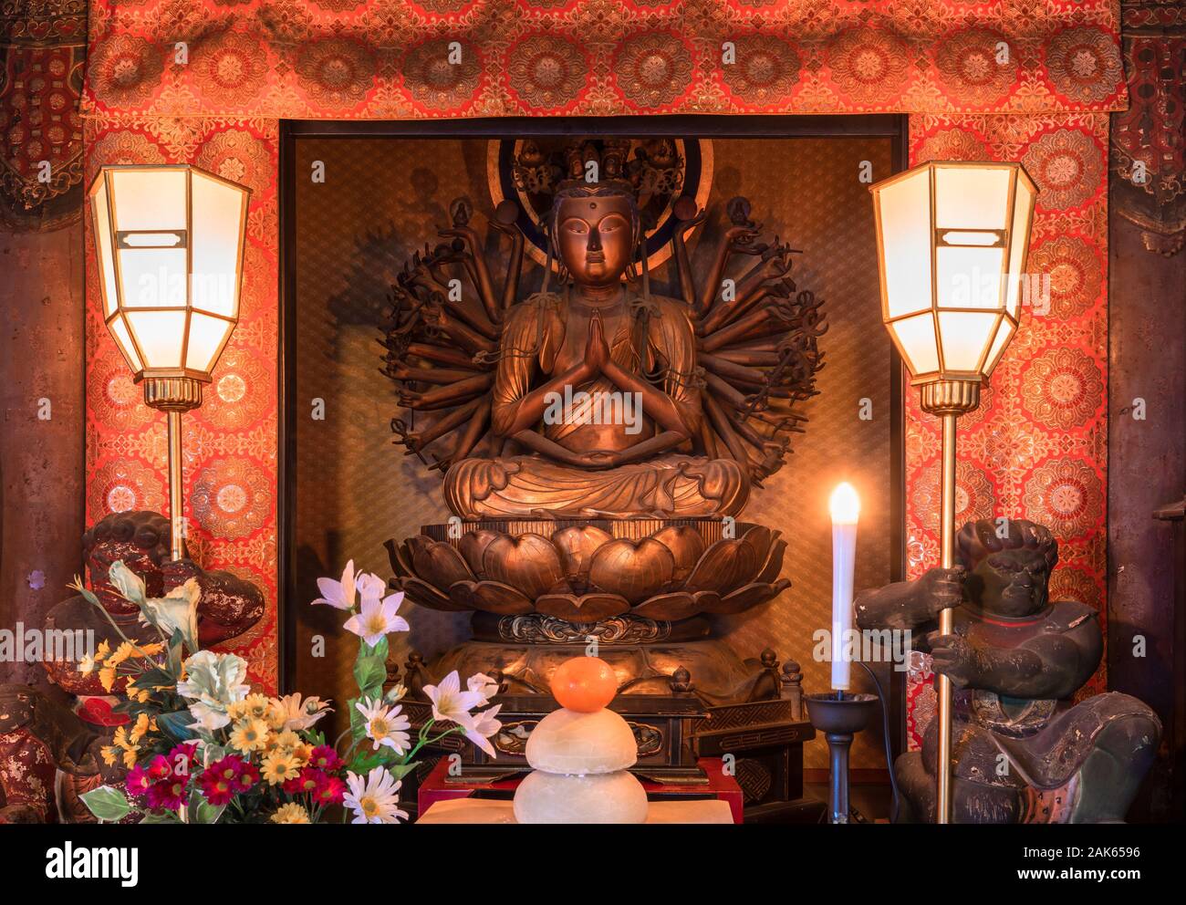 Golden wooden statue depicting the bodhisattva Sente Kannon with ...