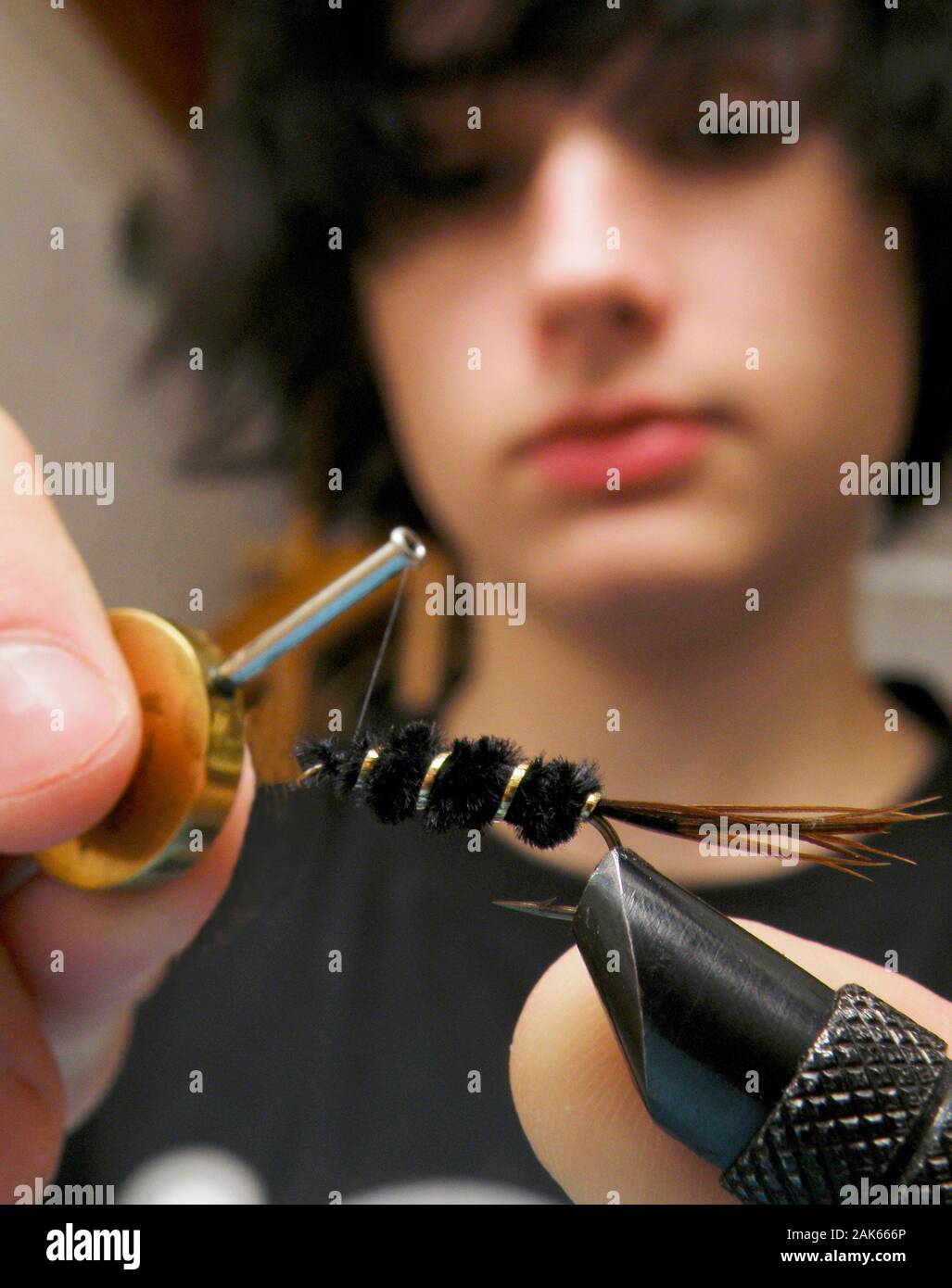 Tying activity hi-res stock photography and images - Alamy