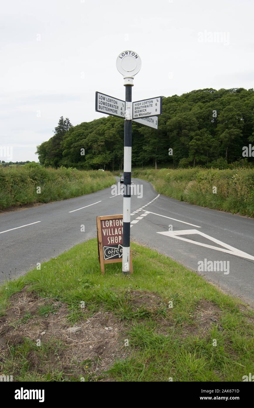 Sign posts Lake District Cumbria UK Cockermouth lake water hill hills ...