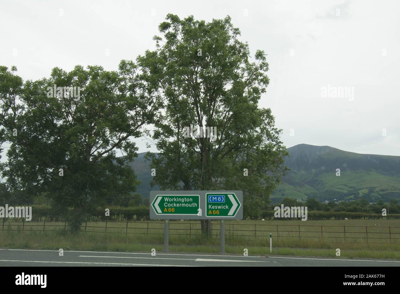 Sign posts Workington Cockermouth Keswick M6 Lake District Cumbria UK ...