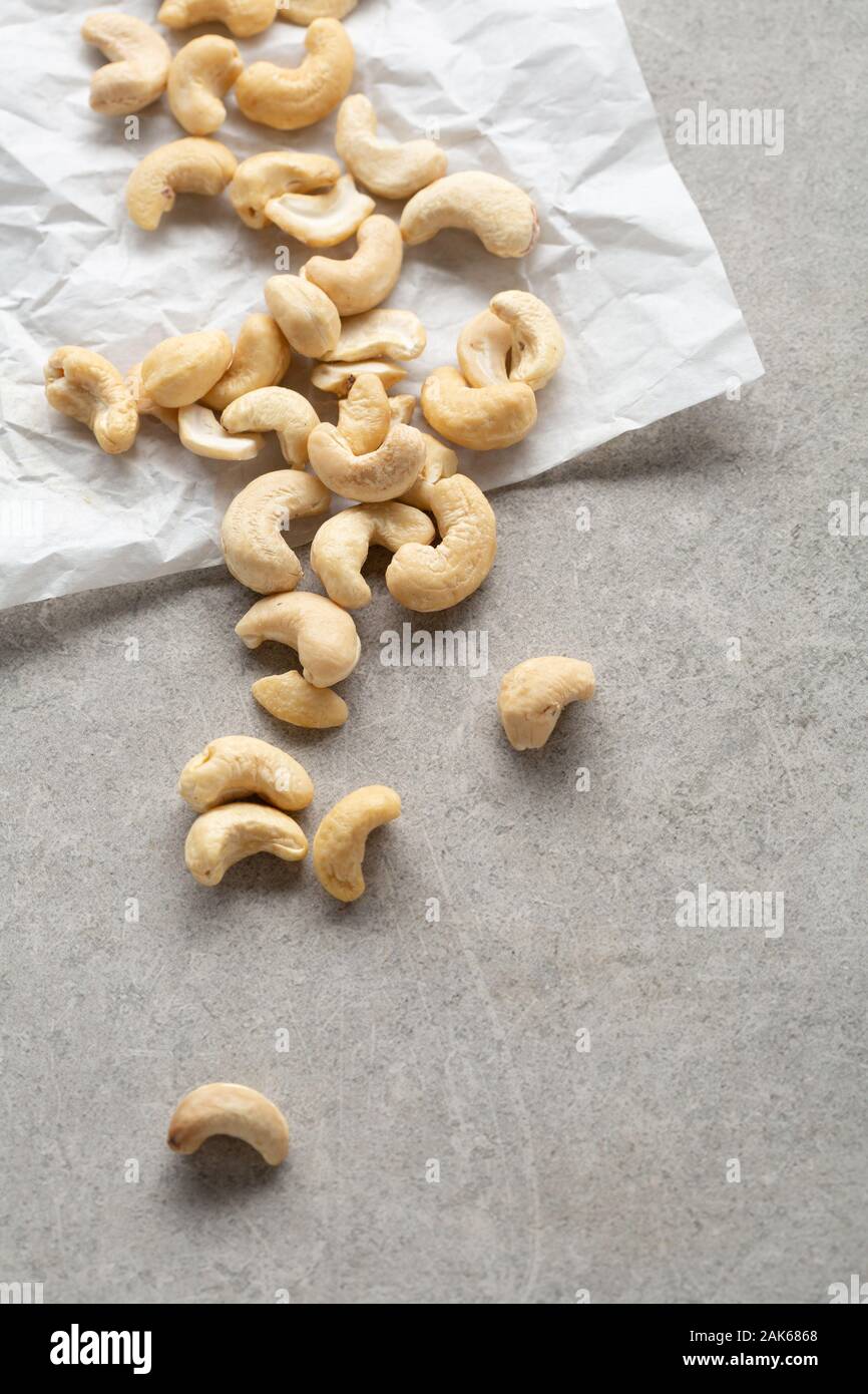 Roasted cashews on gray hi-res stock photography and images - Alamy