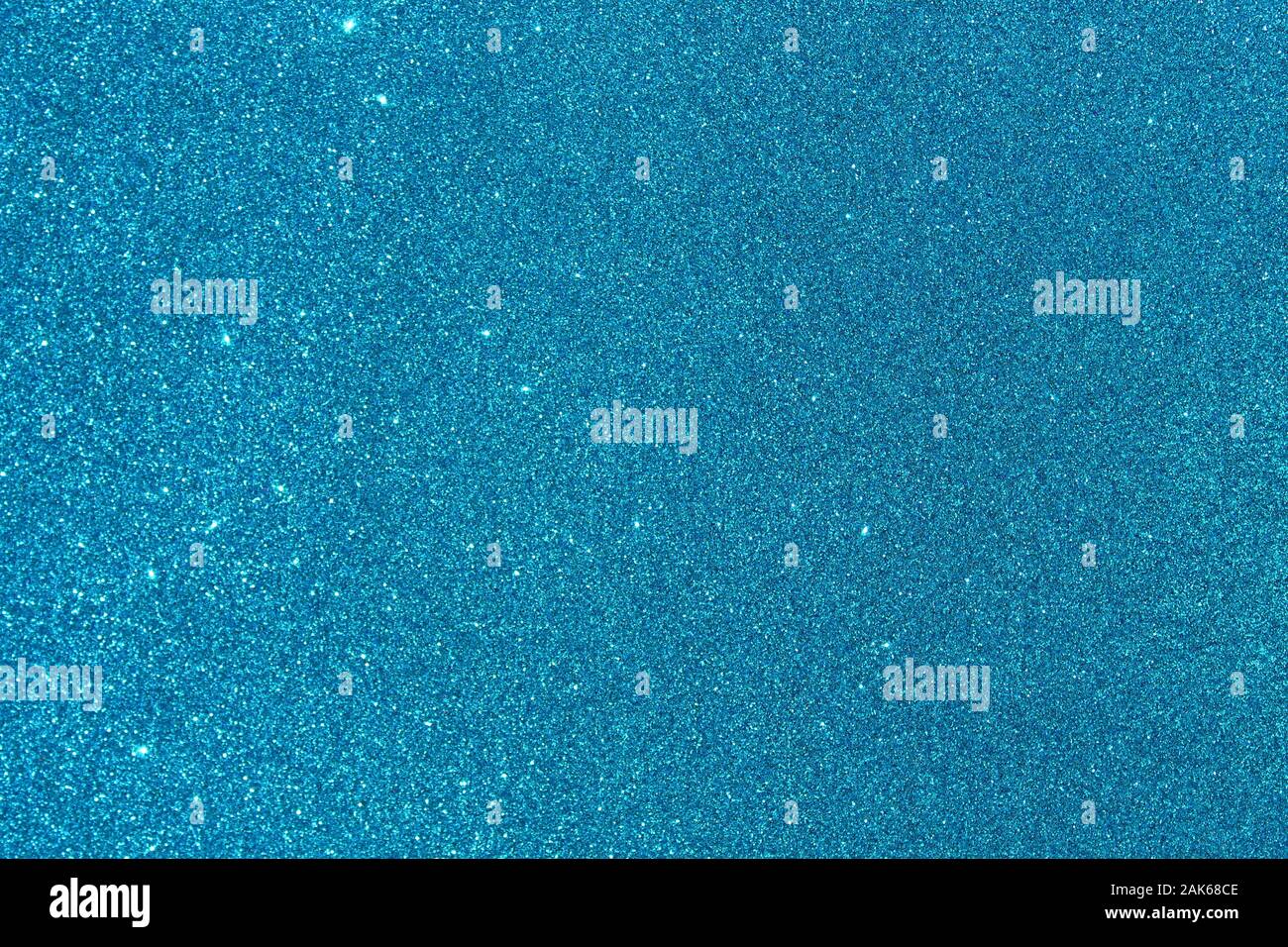 The picture shows a blue glittery background Stock Photo - Alamy