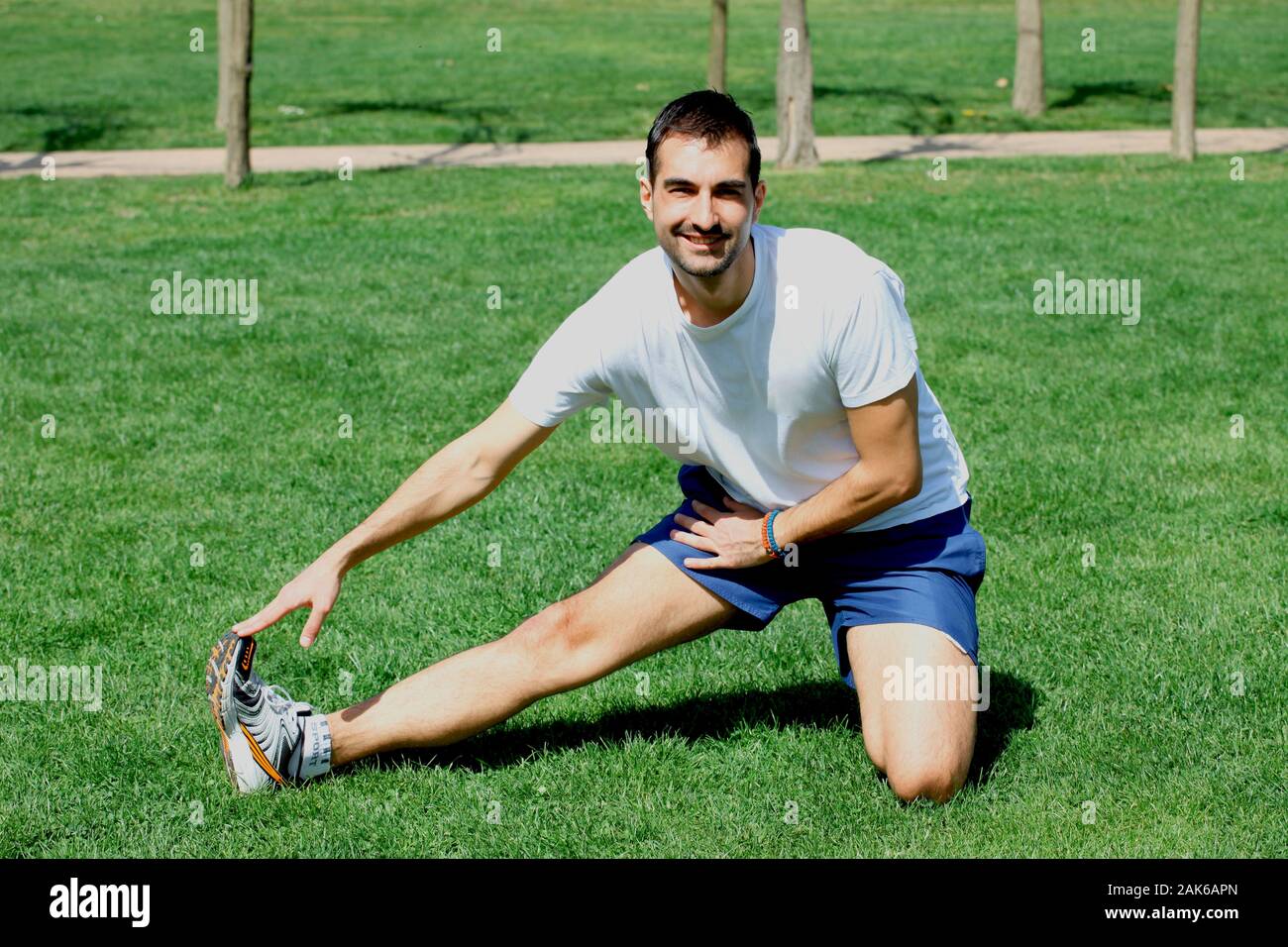Male stretching legs muscles hi-res stock photography and images - Alamy