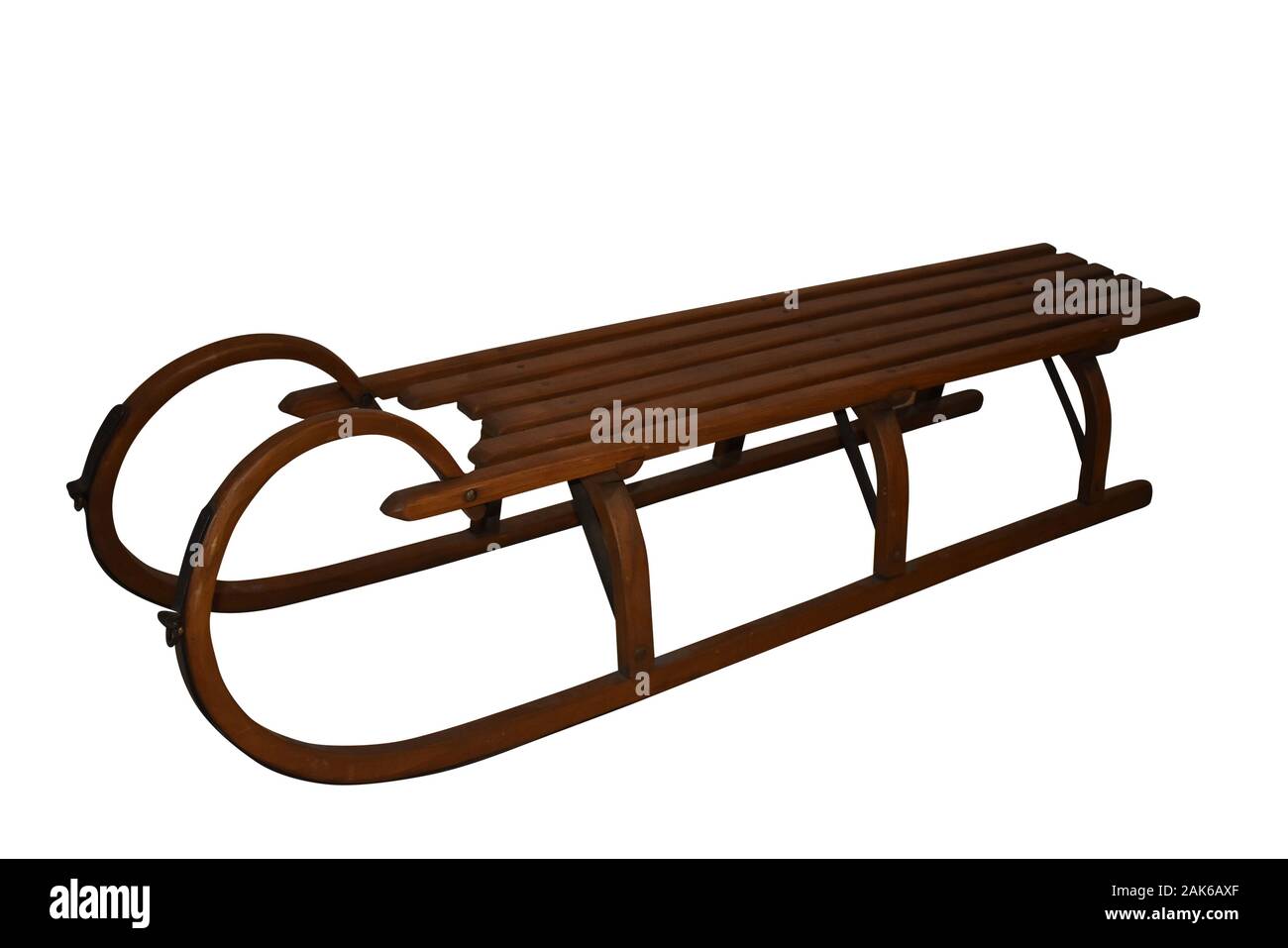 Old vintage wooden snow slider isolated on white background with ...