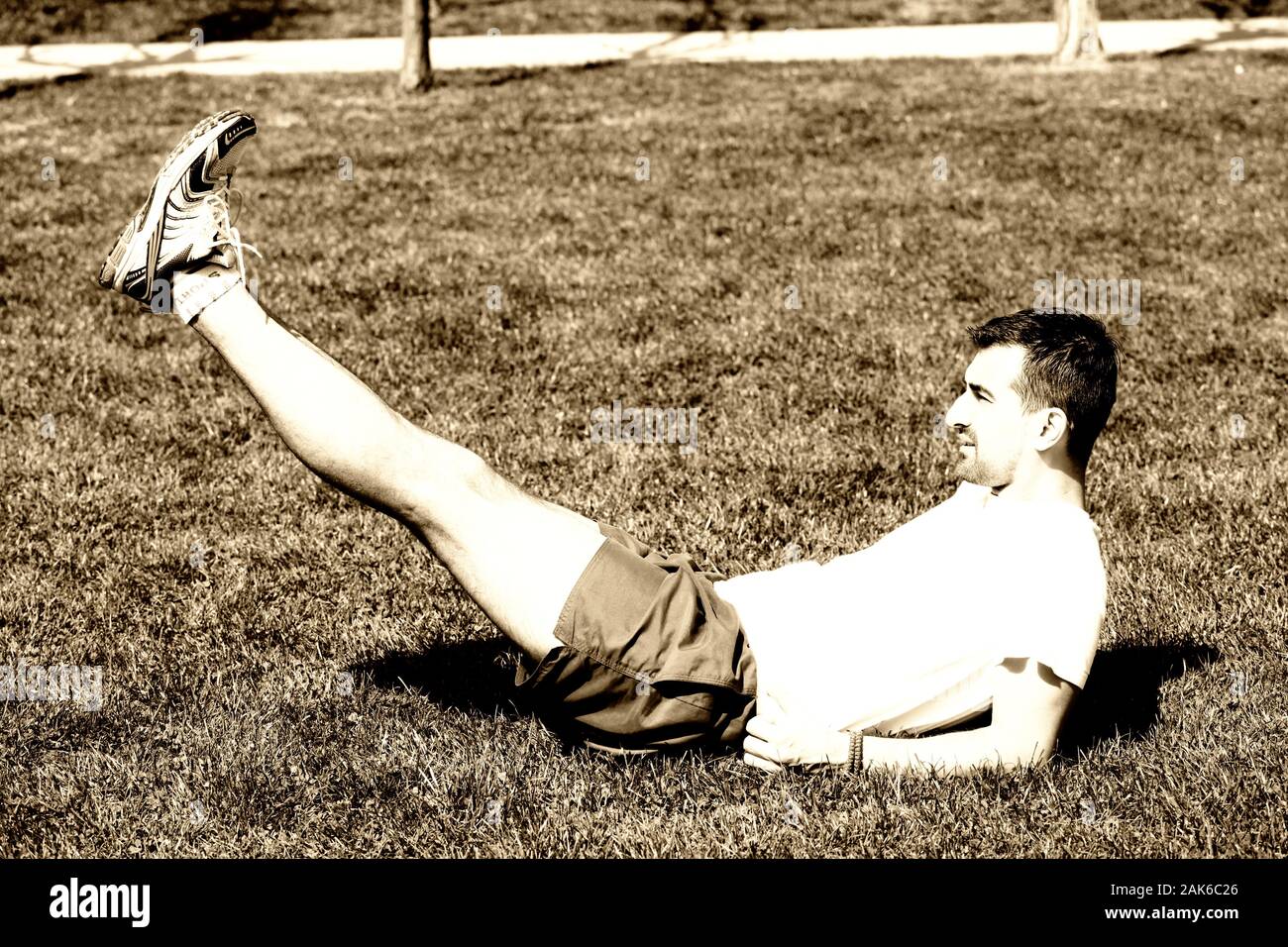 Muscular man exercising home hi-res stock photography and images - Alamy