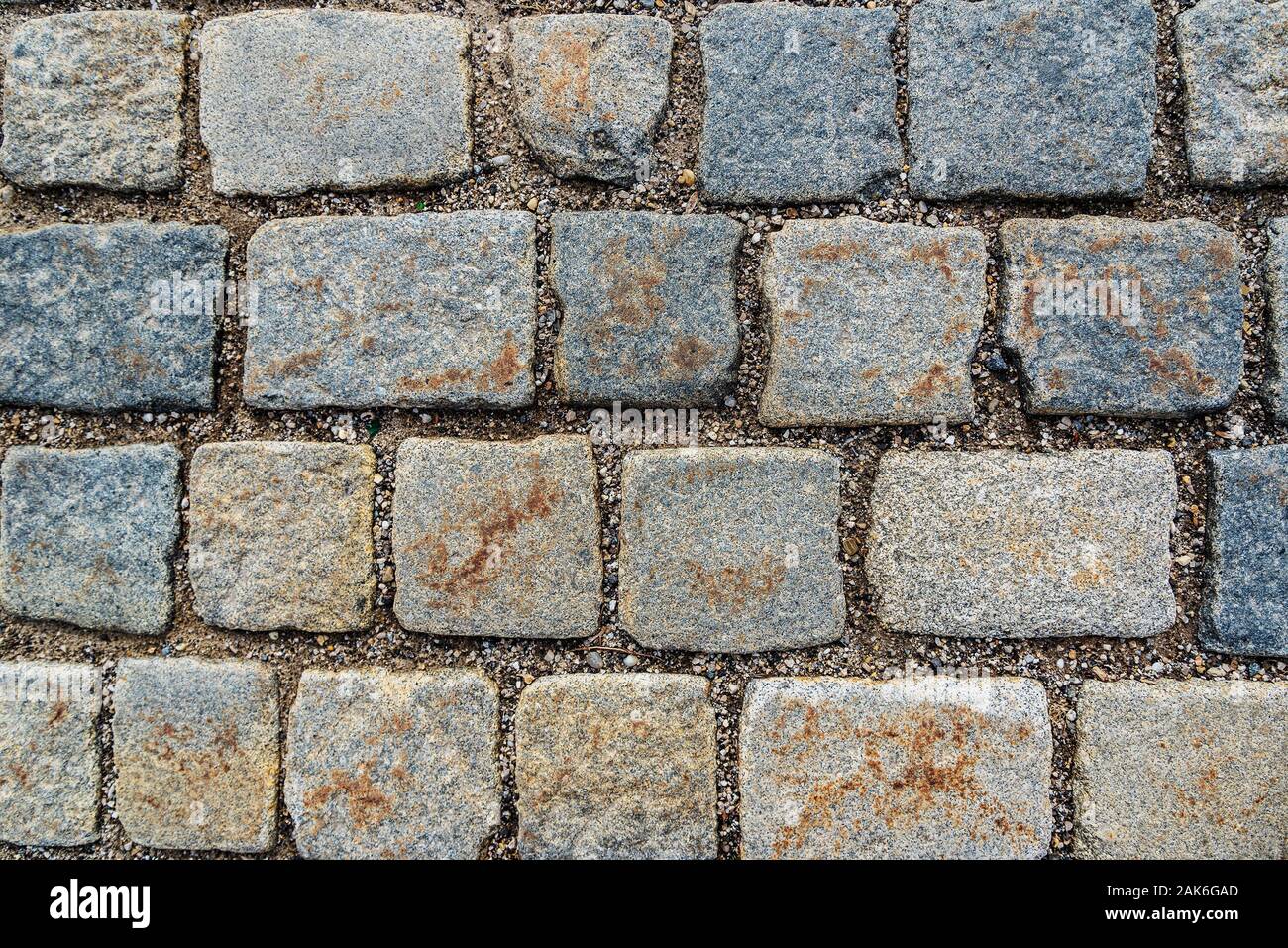 Surface of weathered stone road Stock Photo - Alamy