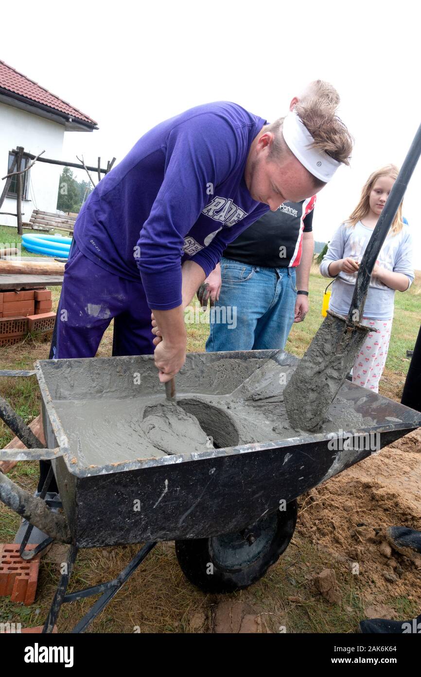 A wheelbarrow with bricks hi-res stock photography and images - Alamy