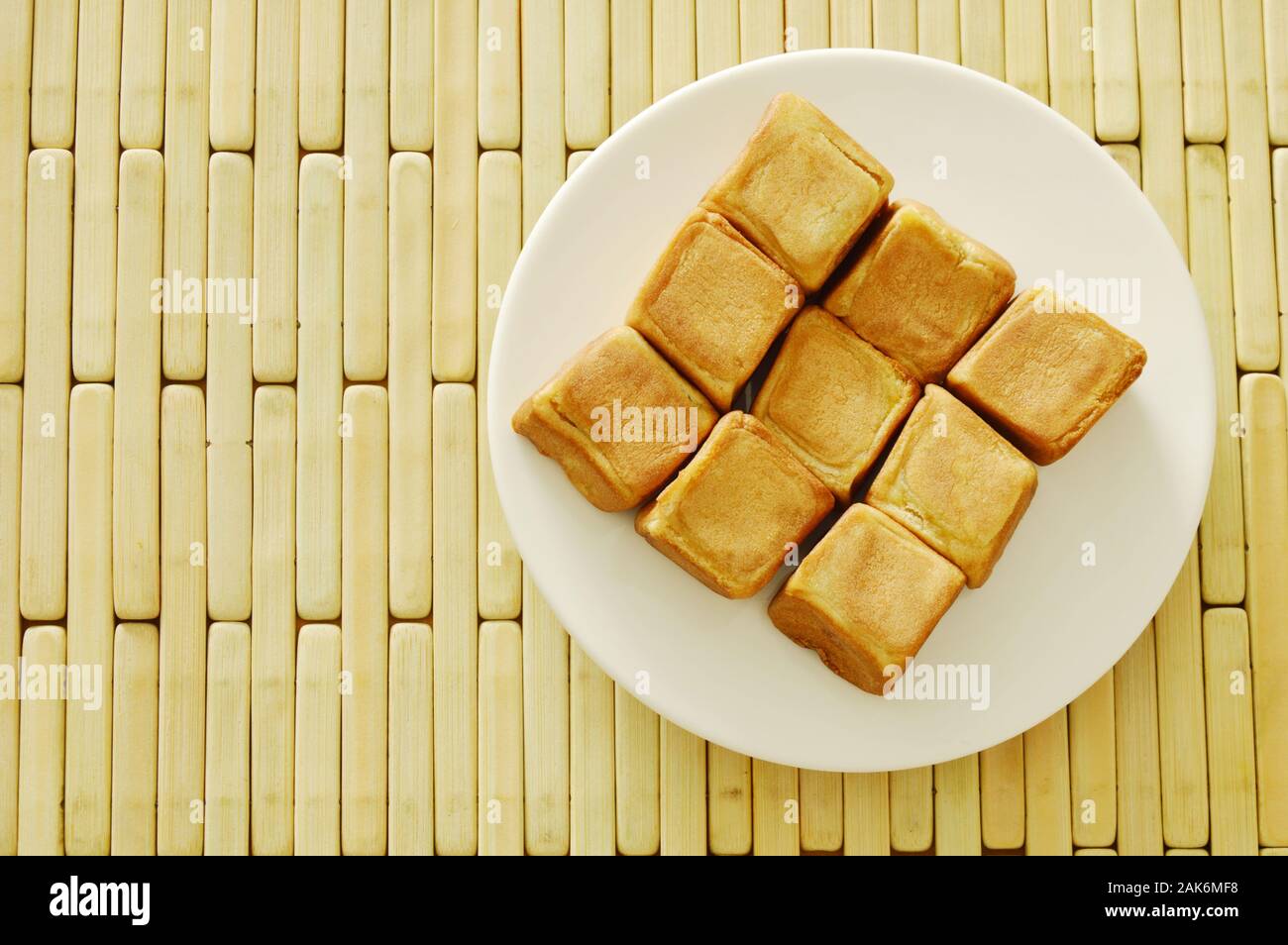 Chinese dice cake stuffed mush sweet bean on cloth Stock Photo - Alamy