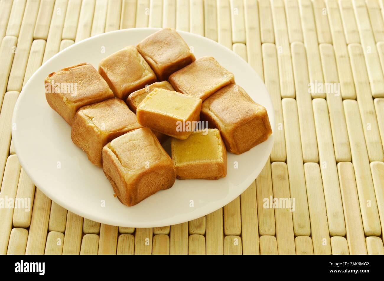 Chinese dice cake stuffed mush sweet bean on cloth Stock Photo - Alamy