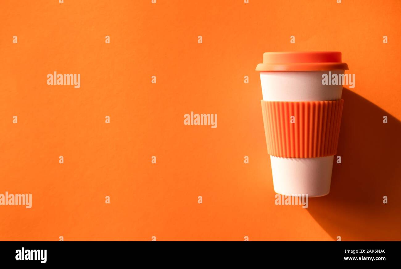 Orange reuseble cup Stock Photo - Alamy