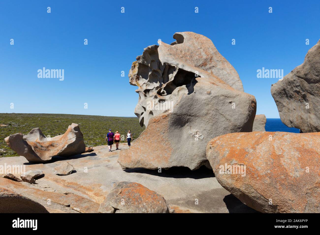 Tourists looking at the Remarkable Rocks, Kangaroo Island Australia ...