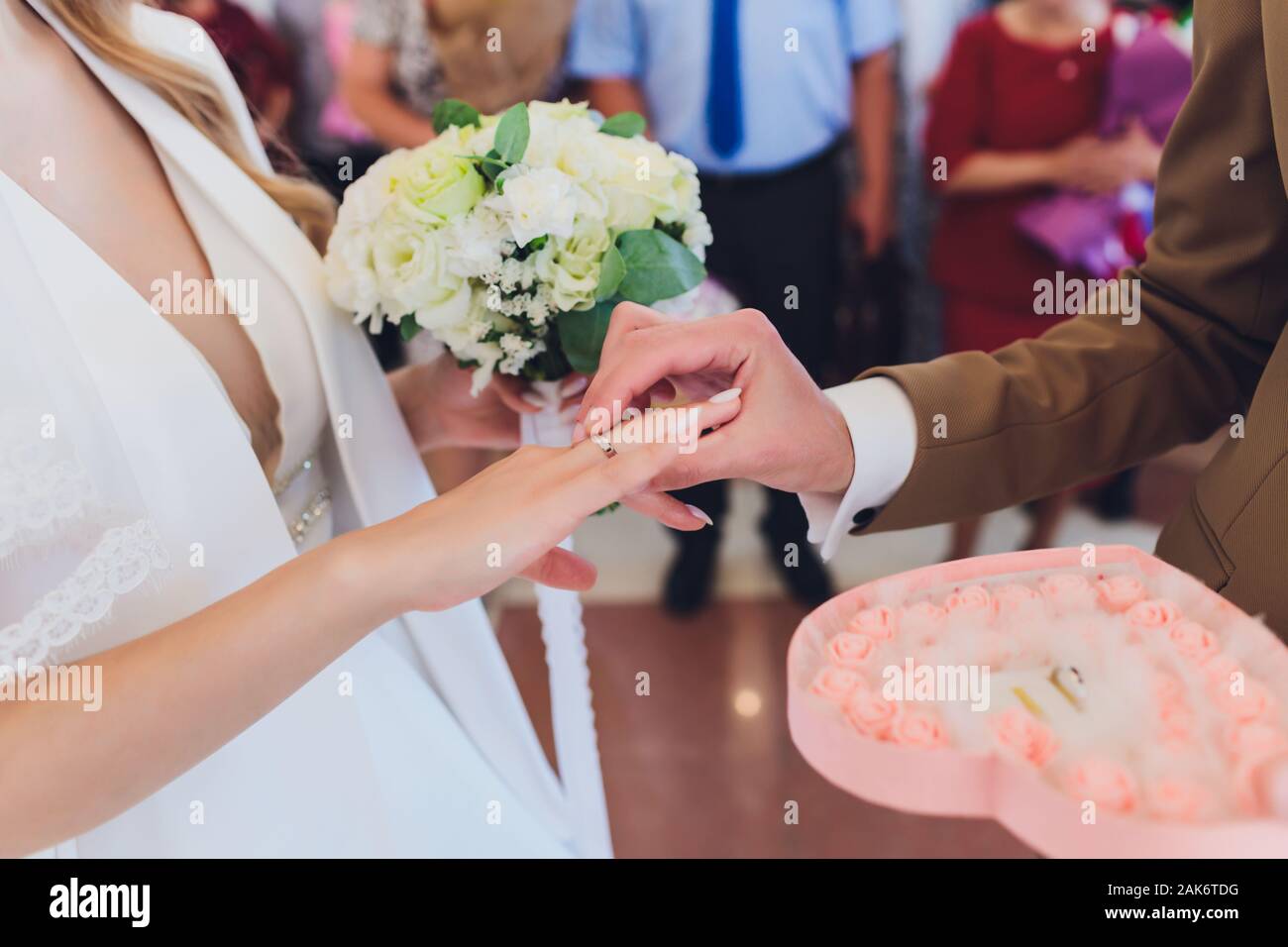 newlyweds append signatures in a registry office during wedding ...