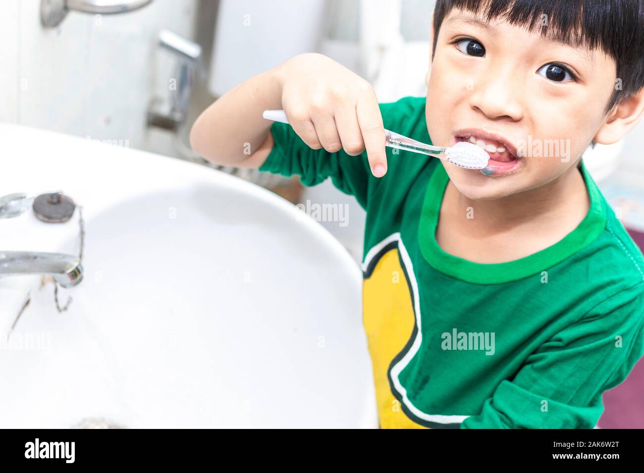 Child wash hand brush teeth hi-res stock photography and images - Alamy