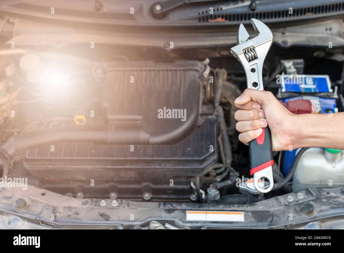 Man repair car holding tools hi-res stock photography and images - Alamy