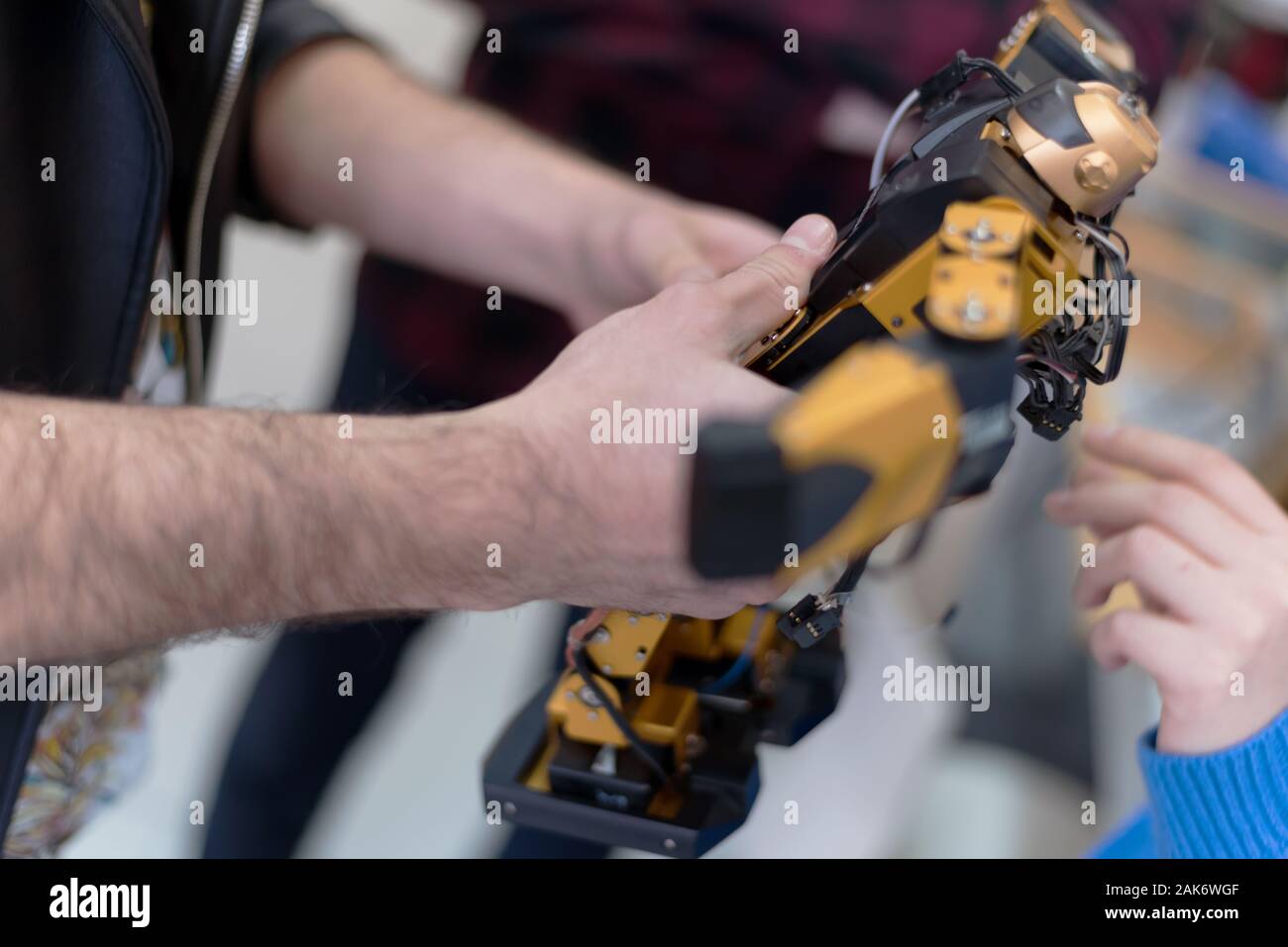 Young woman engineer working on robotics project. Scientist engineer ...