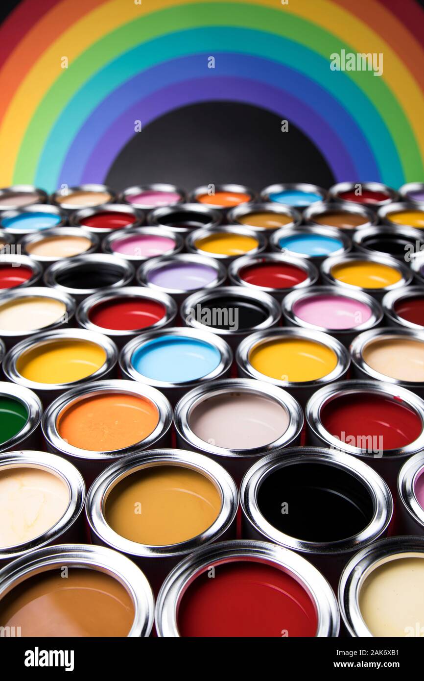 Group of tin metal cans with color paint Stock Photo - Alamy