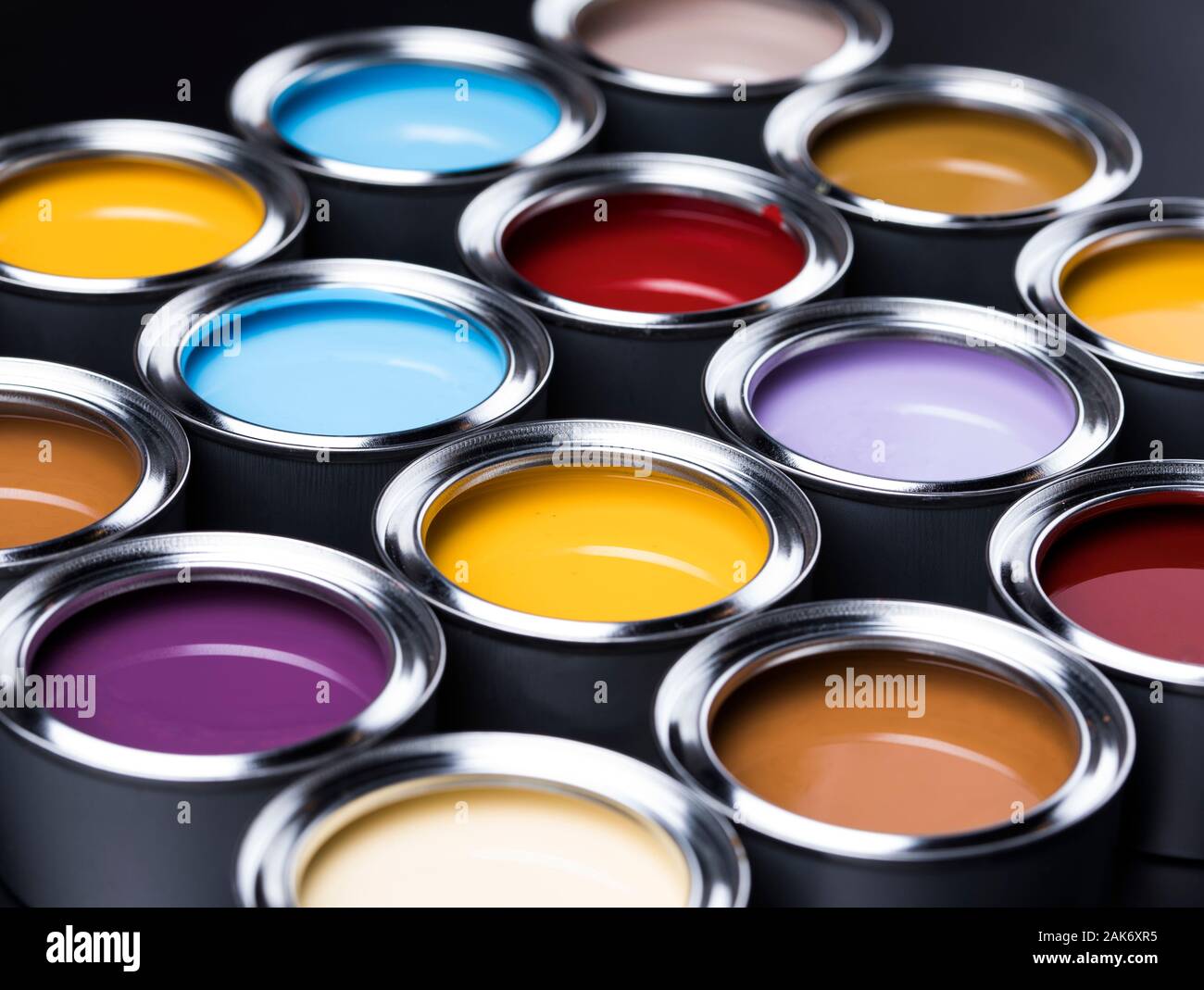 Group of tin metal cans with color paint Stock Photo - Alamy