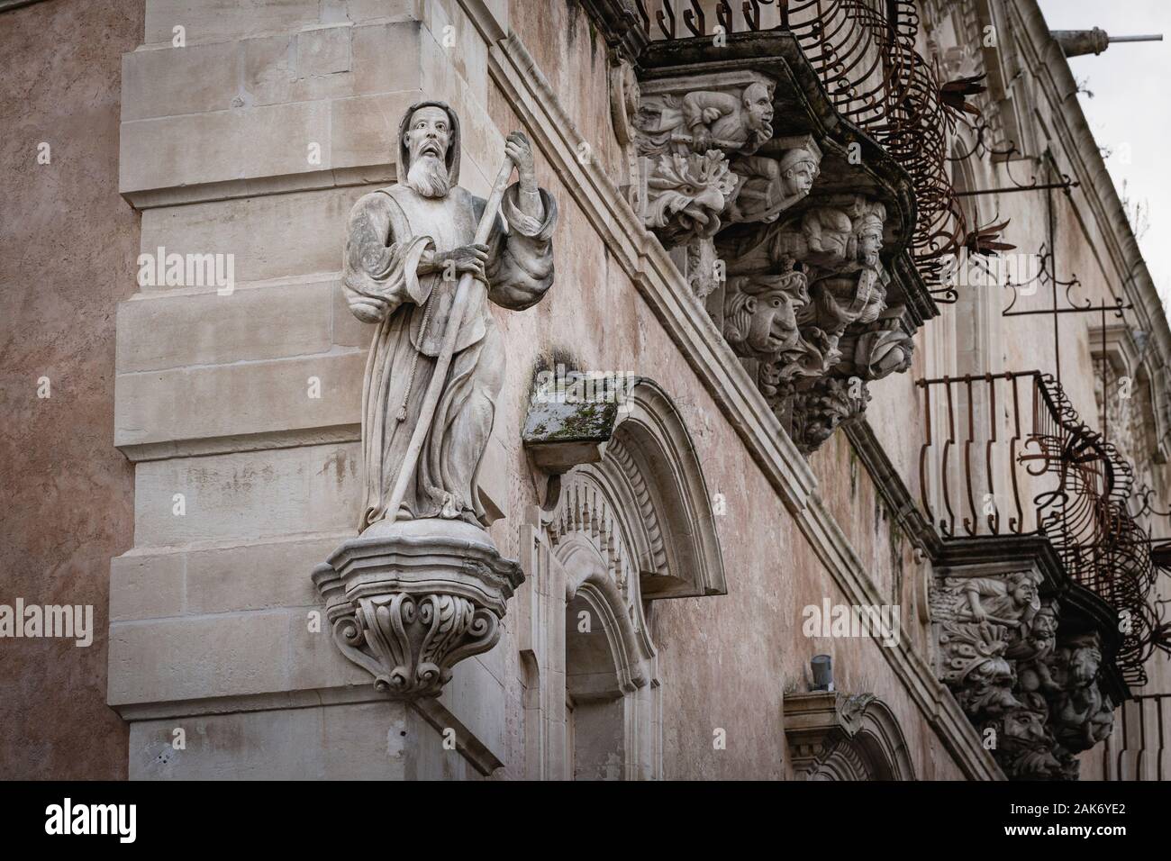 Saint Francis of Paola statue, baroque facade of Palazzo Cosentini ...