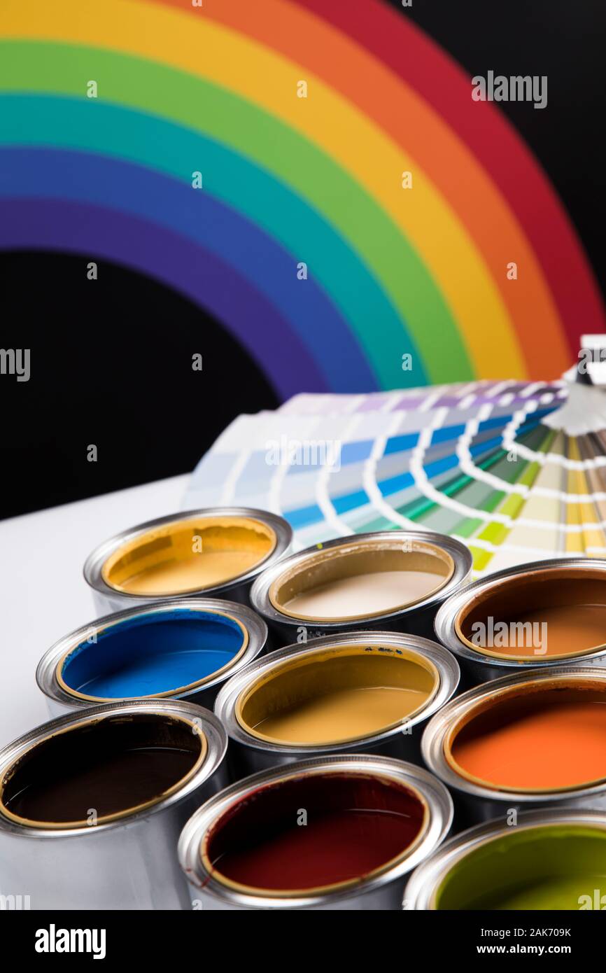 Rainbow colors, Open cans of paint Stock Photo - Alamy