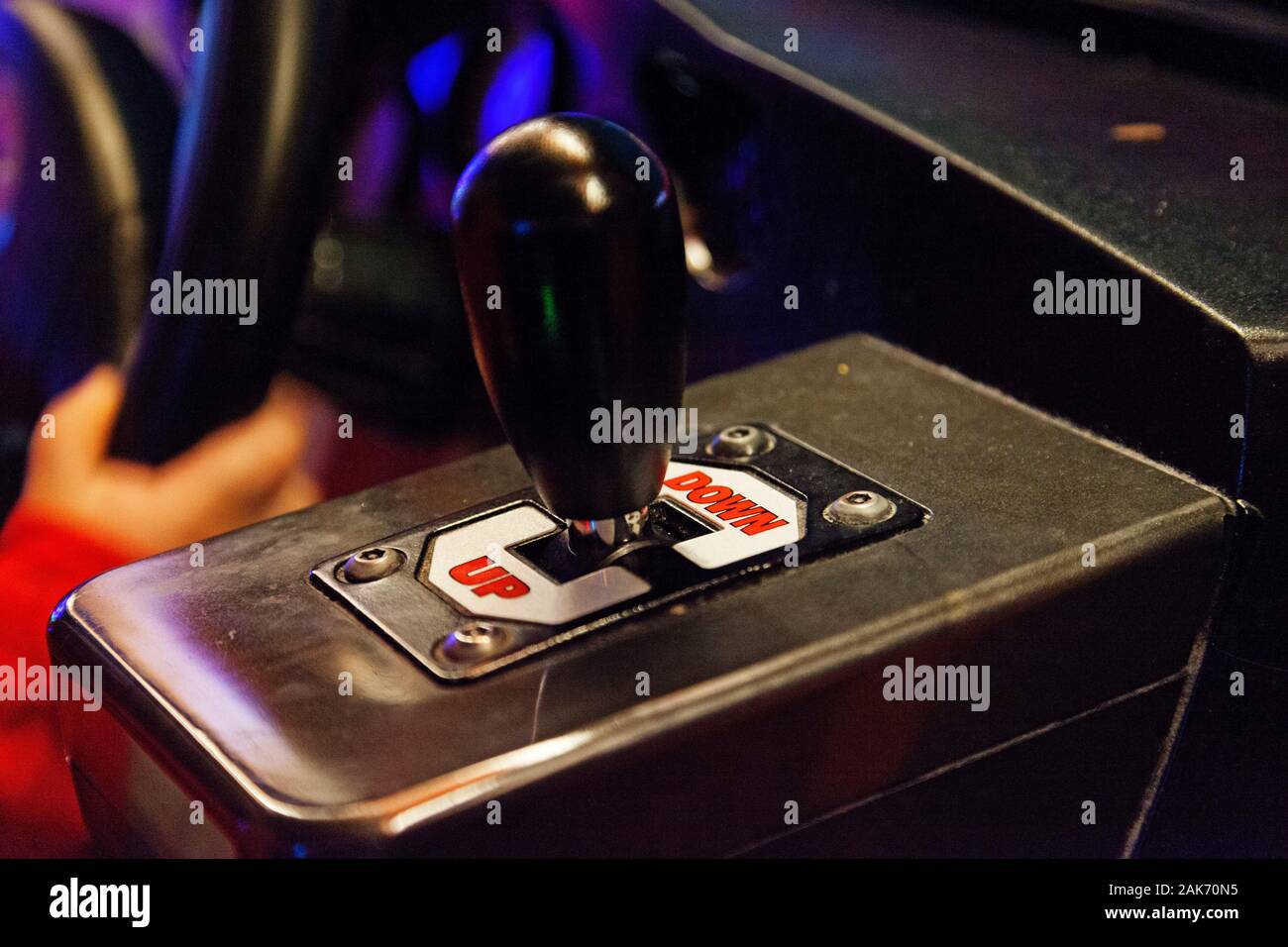 gear stick for car games in arcade cabinet Stock Photo - Alamy