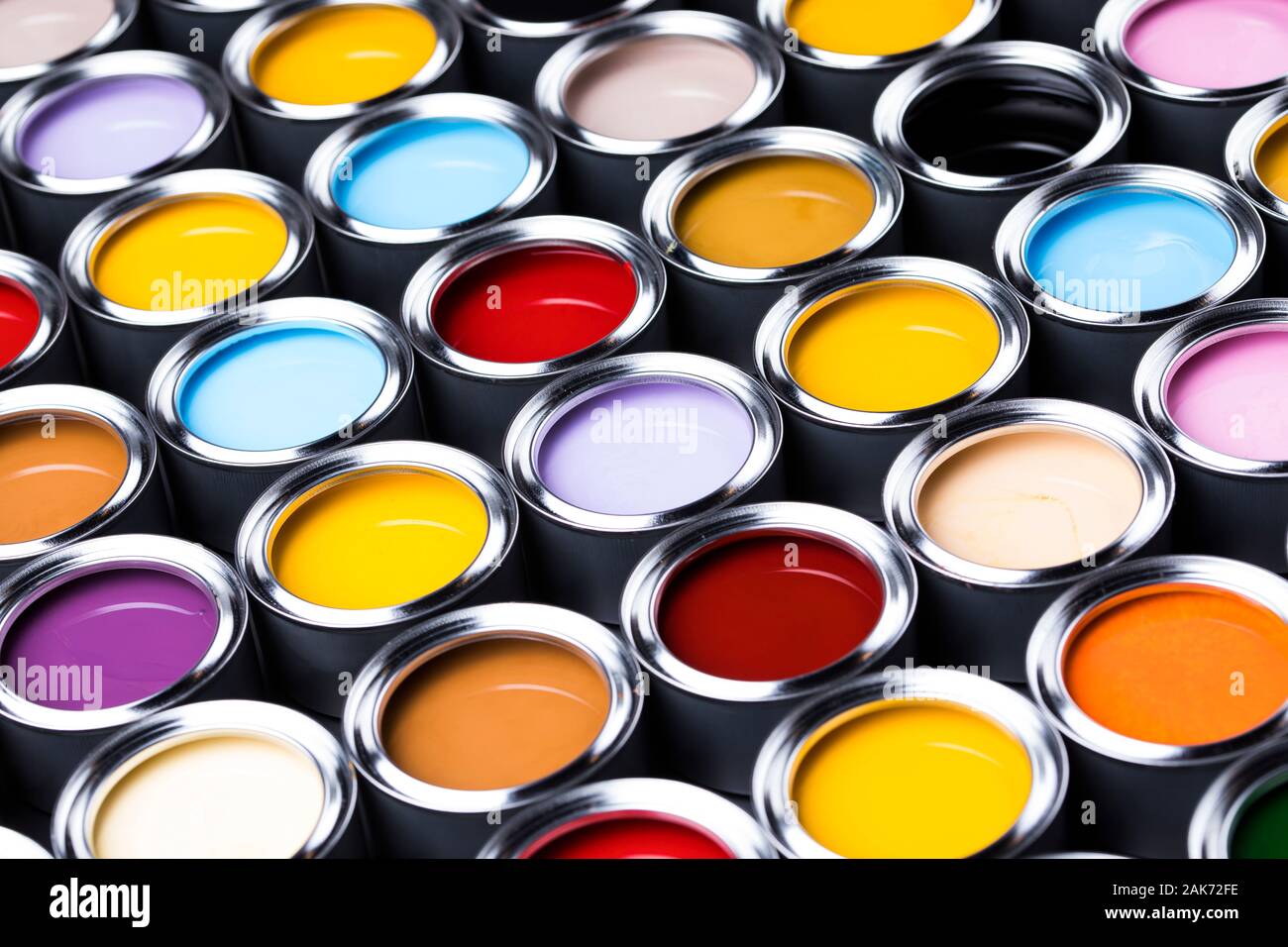 Group of tin metal cans with color paint Stock Photo - Alamy