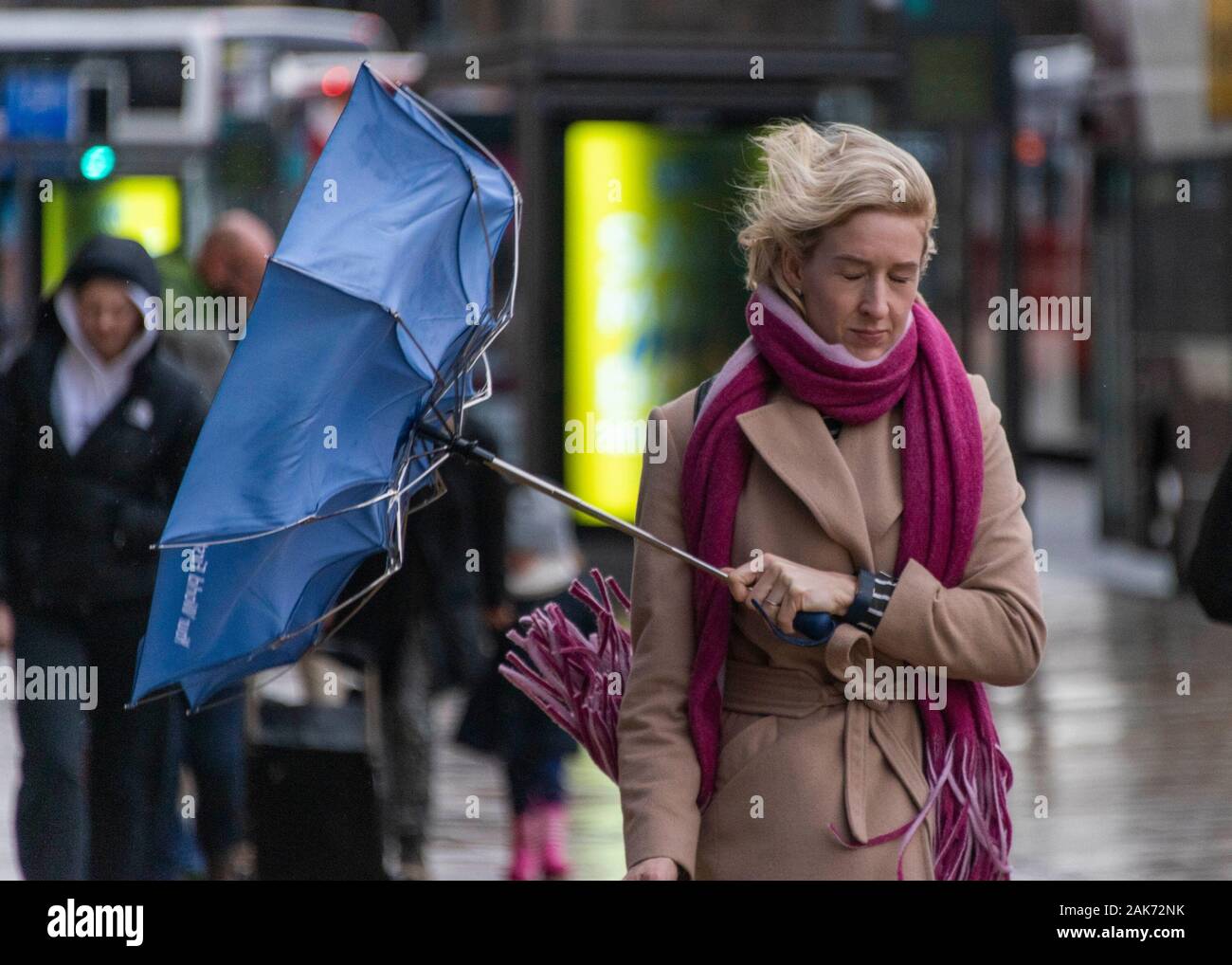 Windy umbrella scotland hi-res stock photography and images - Alamy