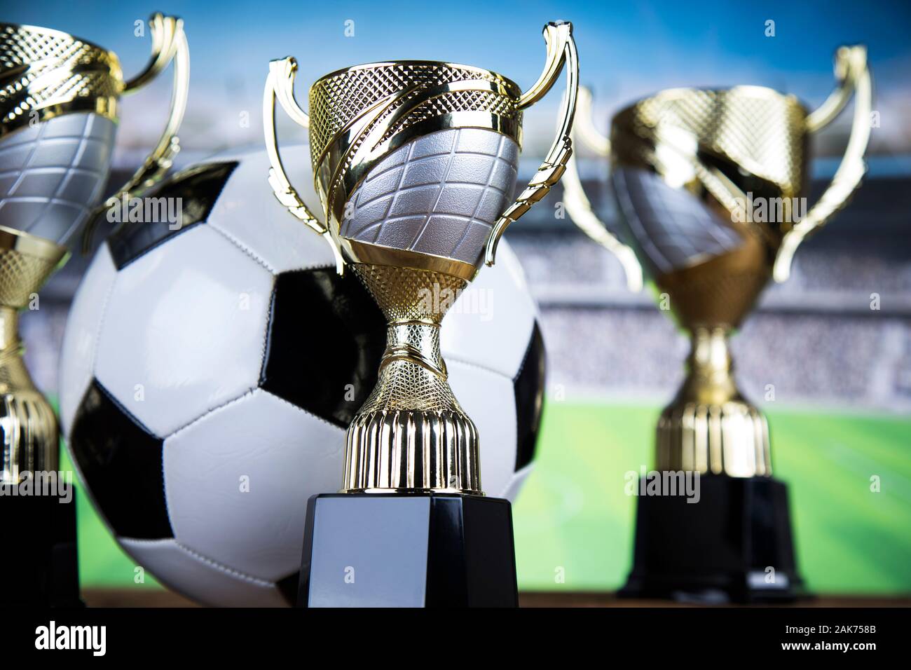 Winning trophy championship award, sport stadium background Stock Photo ...