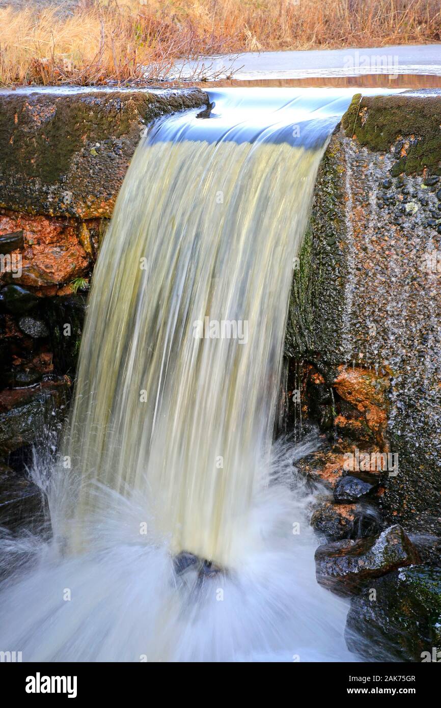 Water stream falling from boulder hi-res stock photography and images ...