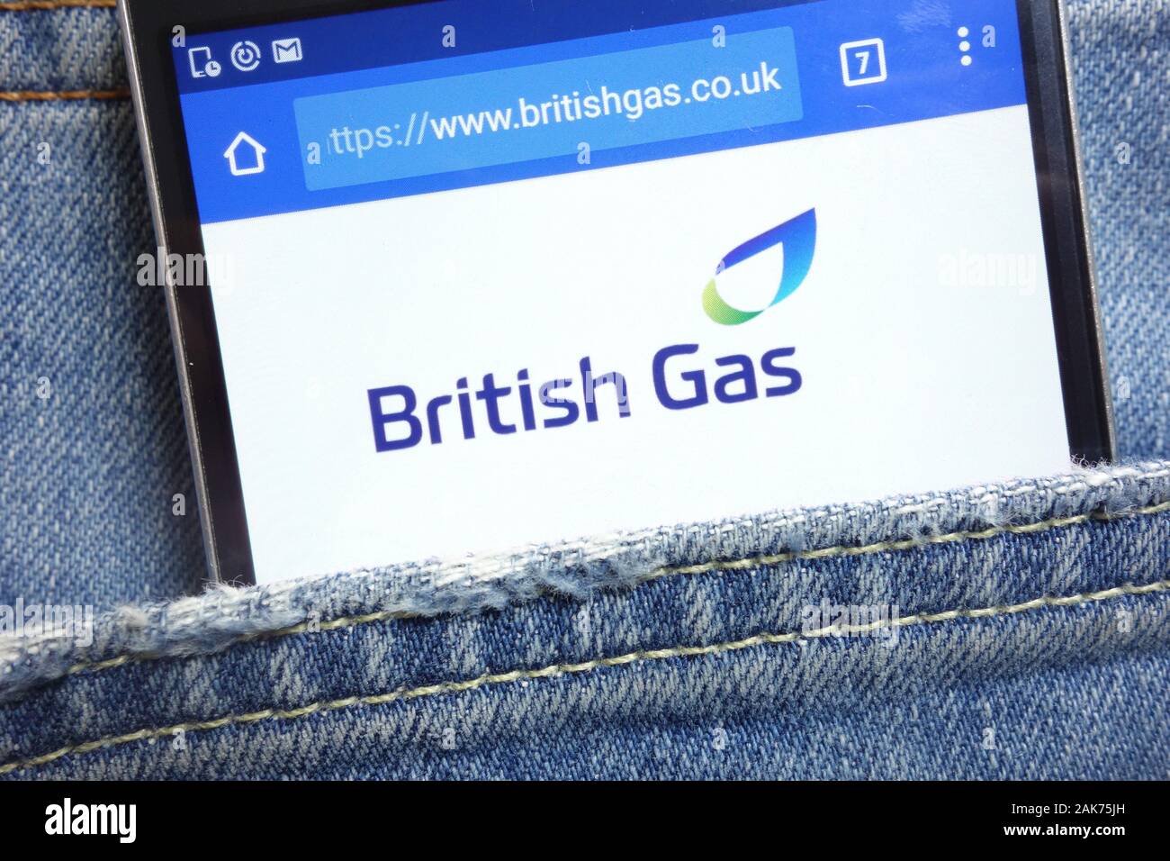 British Gas website displayed on smartphone hidden in jeans pocket ...