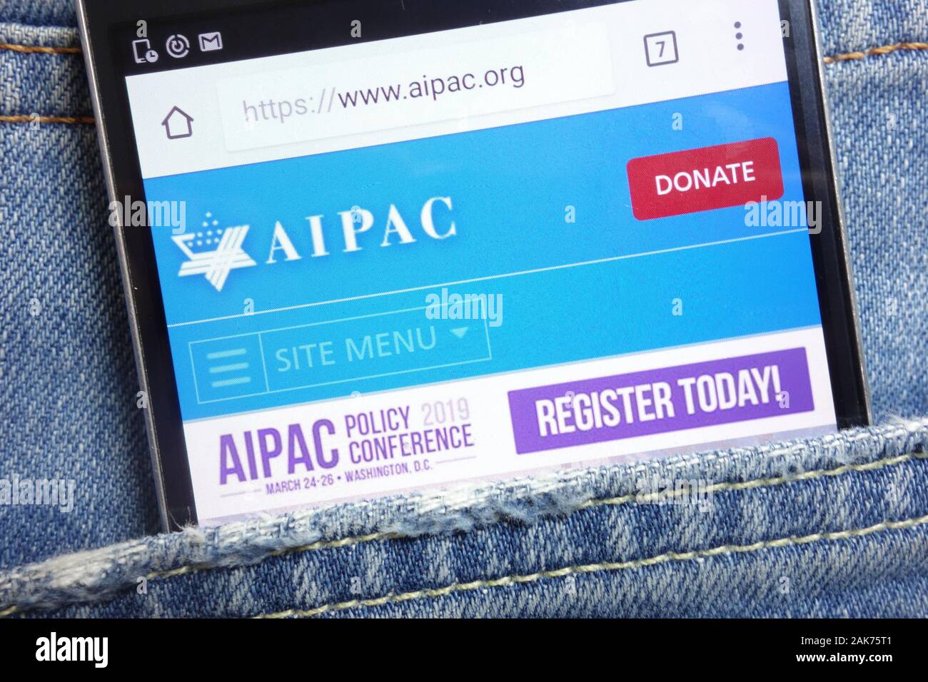 AIPAC website displayed on smartphone hidden in jeans pocket Stock ...