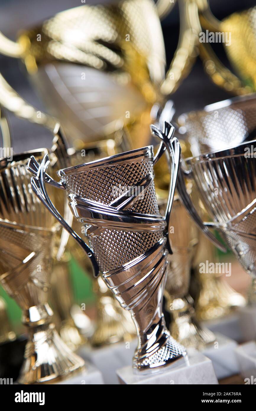 Winning trophy championship award, sport stadium background Stock Photo ...