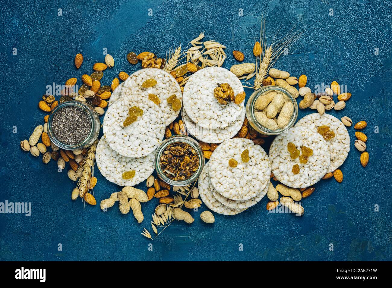 American puffed rice cakes. Healthy snacks with ears of wheat on ...