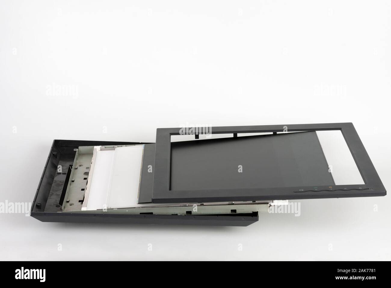 Several parts of LCD monitor, plastic frame, panel consists of ...