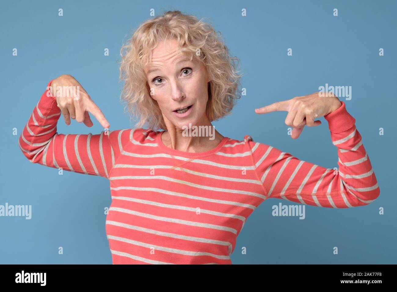 Stressed embarrassed caucasian senior woman hi-res stock photography ...