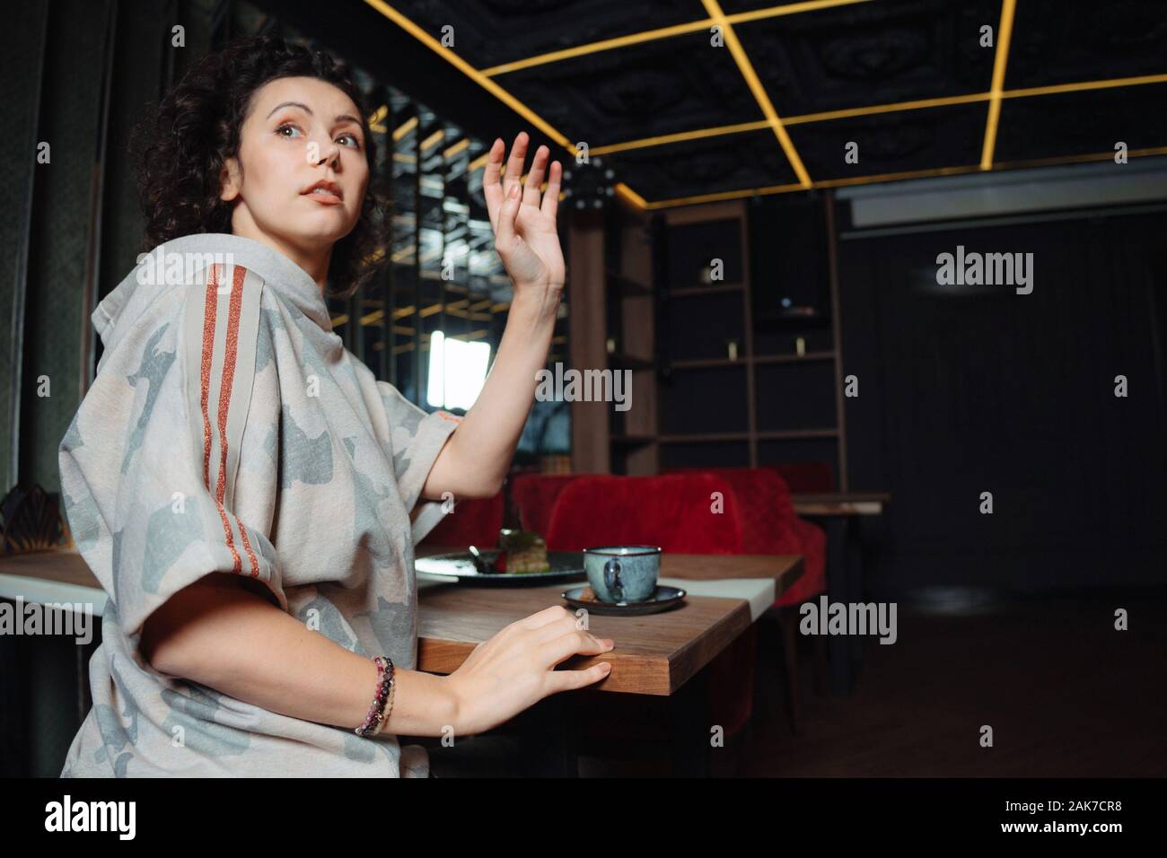 Restaurant customer calling waiter hi-res stock photography and images ...