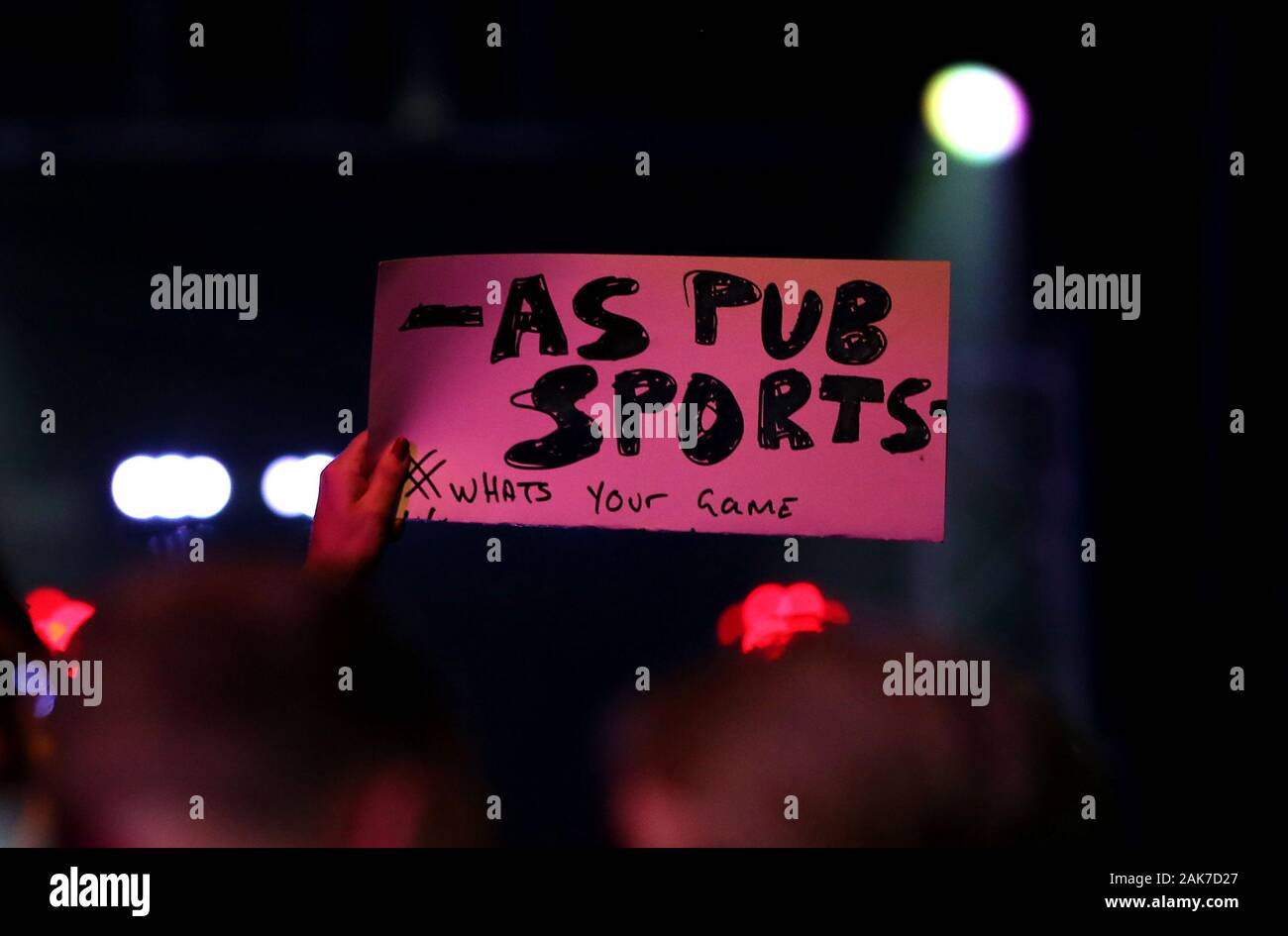 A fan holds up a sign during day four of the BDO World Professional ...