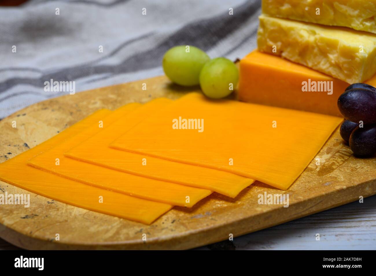 Cheese collection, blocks and slices of yellow and matures english ...