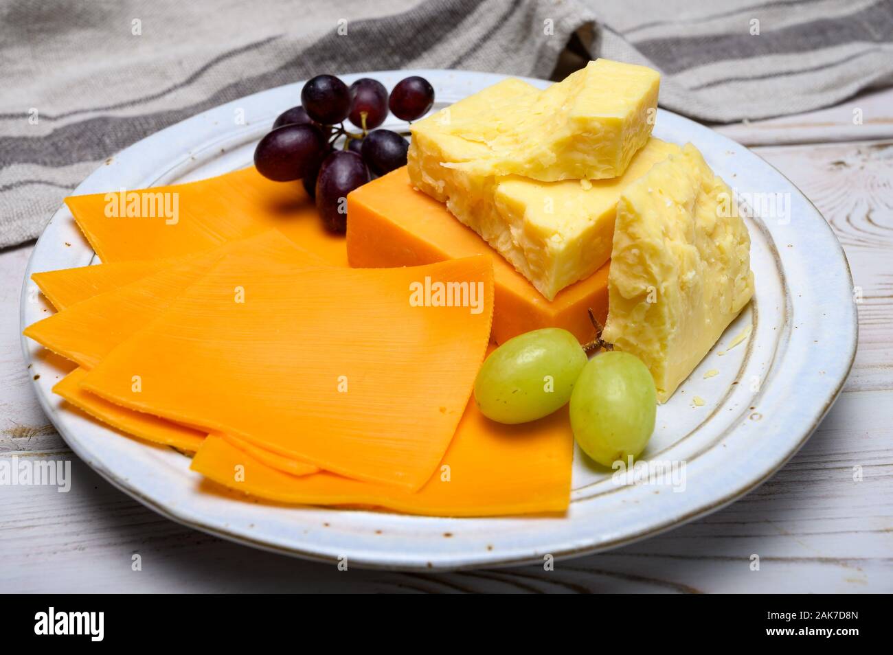 Cheese collection, blocks and slices of yellow and matures english ...