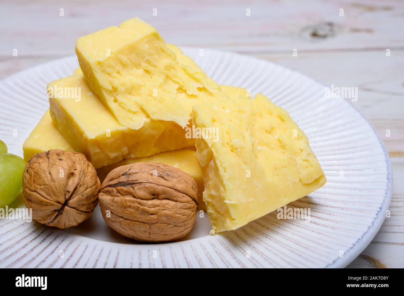Cheese collection, blocks of matured english cheddar cheese close up ...