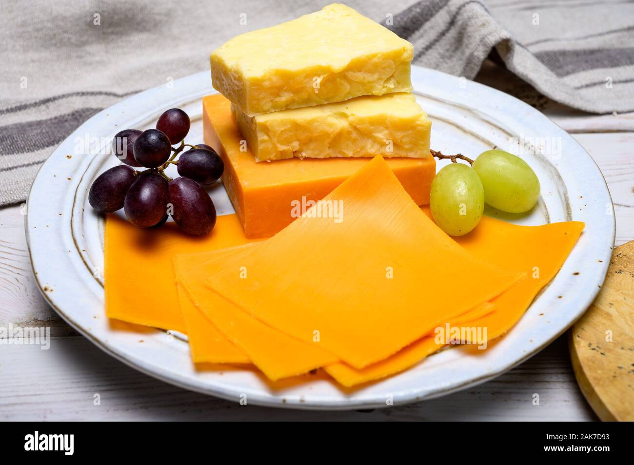 Cheese collection, blocks and slices of yellow and matures english ...